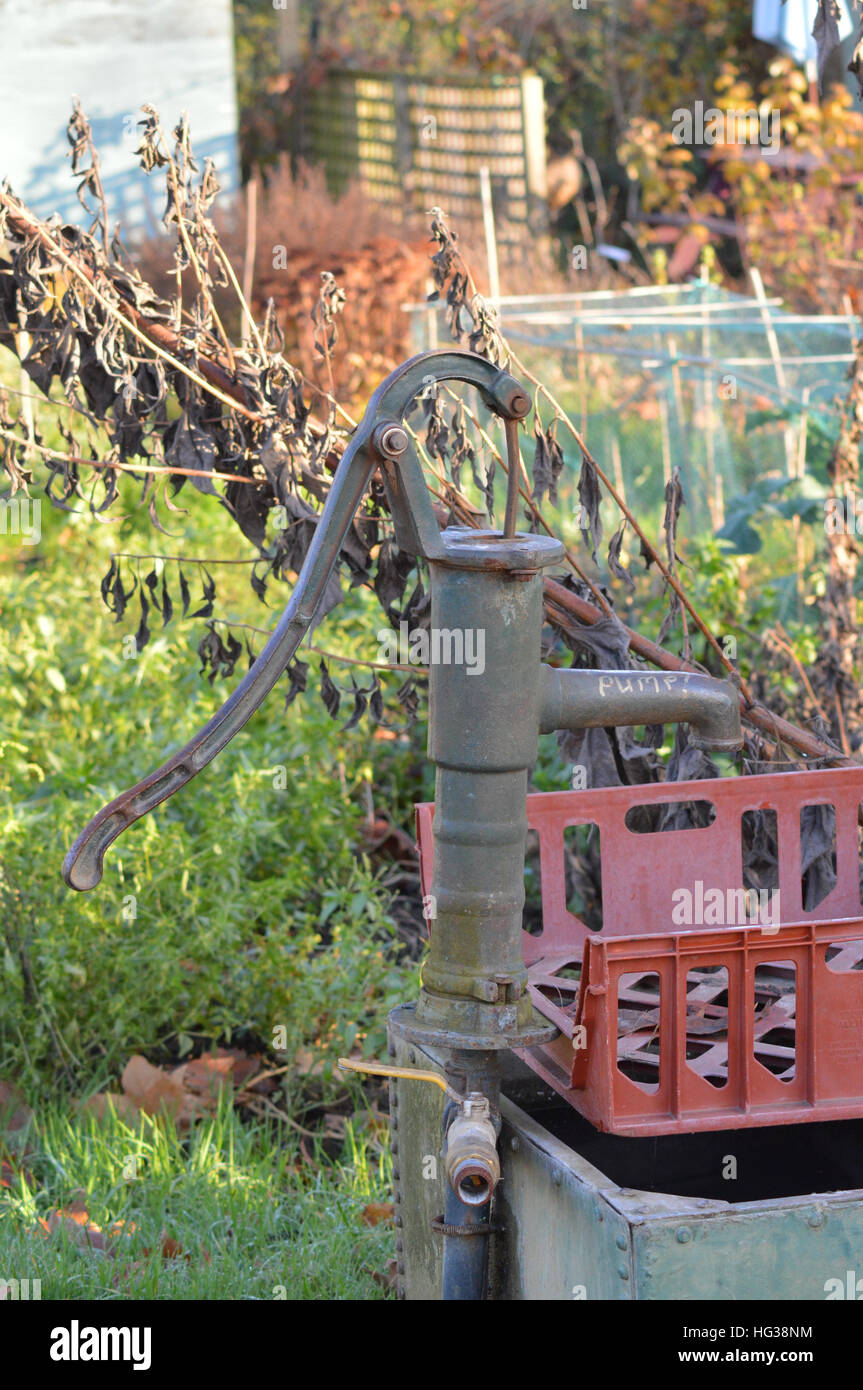 Old fashioned water pump Stock Photo - Alamy