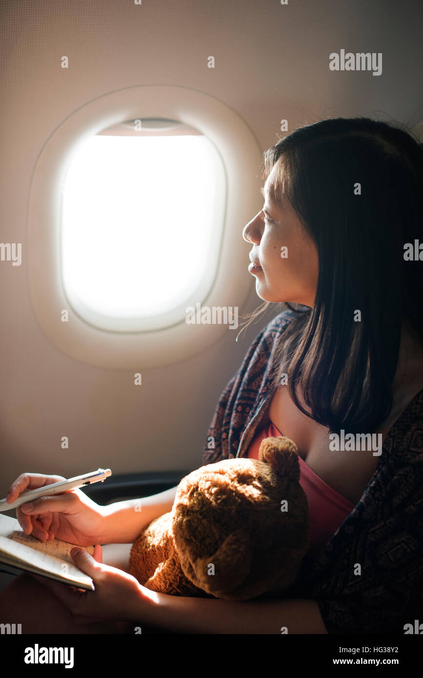 Woman Reading Writing Book Plane Concept Stock Photo - Alamy