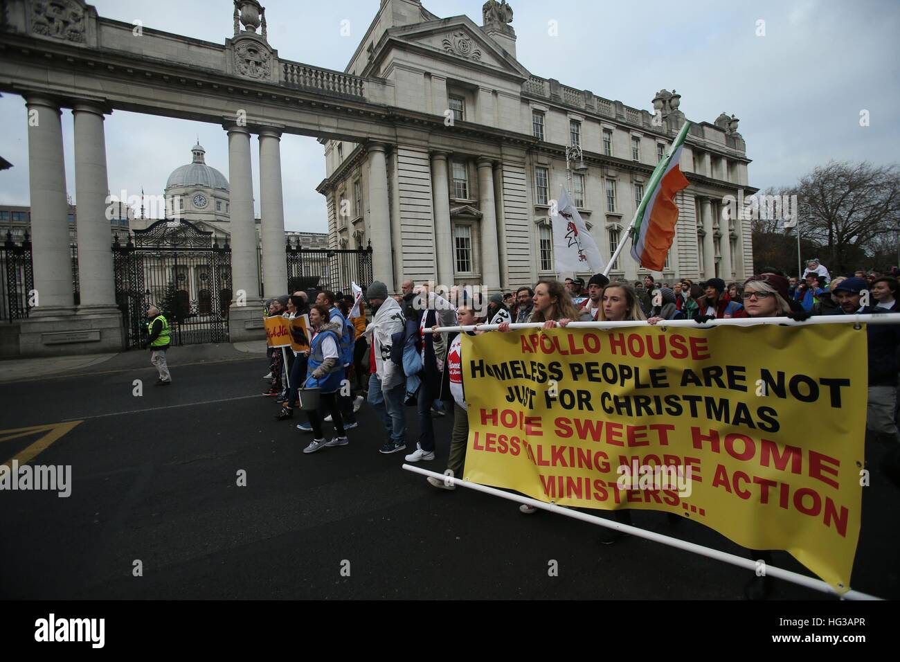 Demonstrators march past Government Buildings from Apollo House, Dublin ...