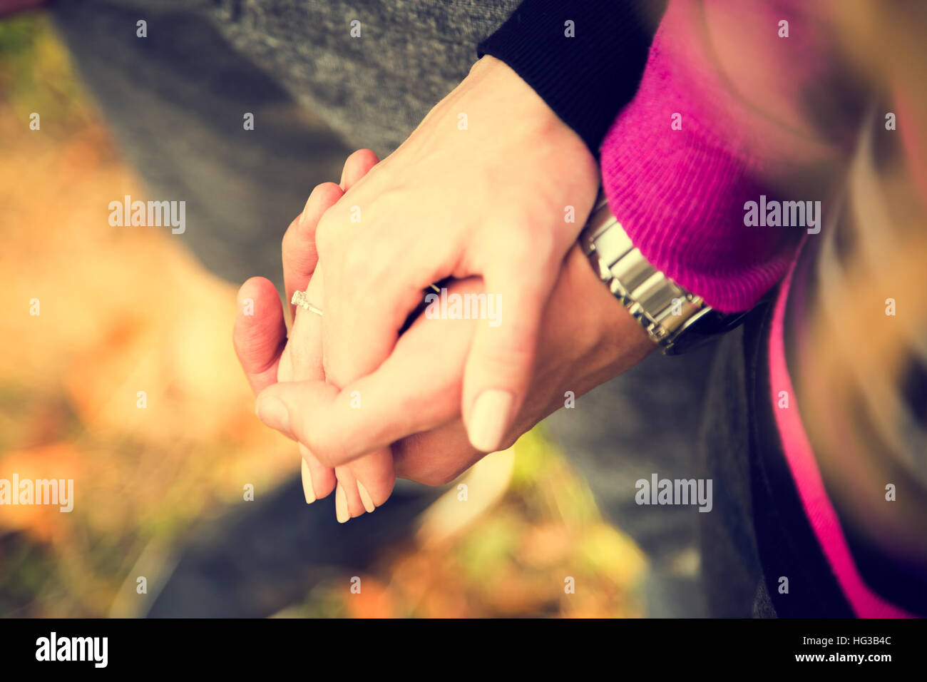 Closeup Hands of a Couple Held Together Stock Photo - Alamy