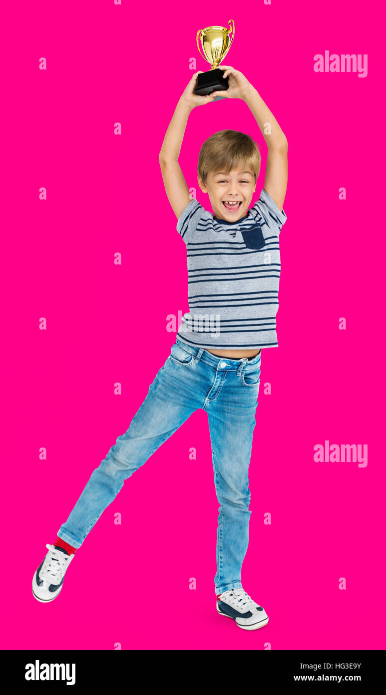 Boy Won Award Reward Cup Prize Concept Stock Photo - Alamy