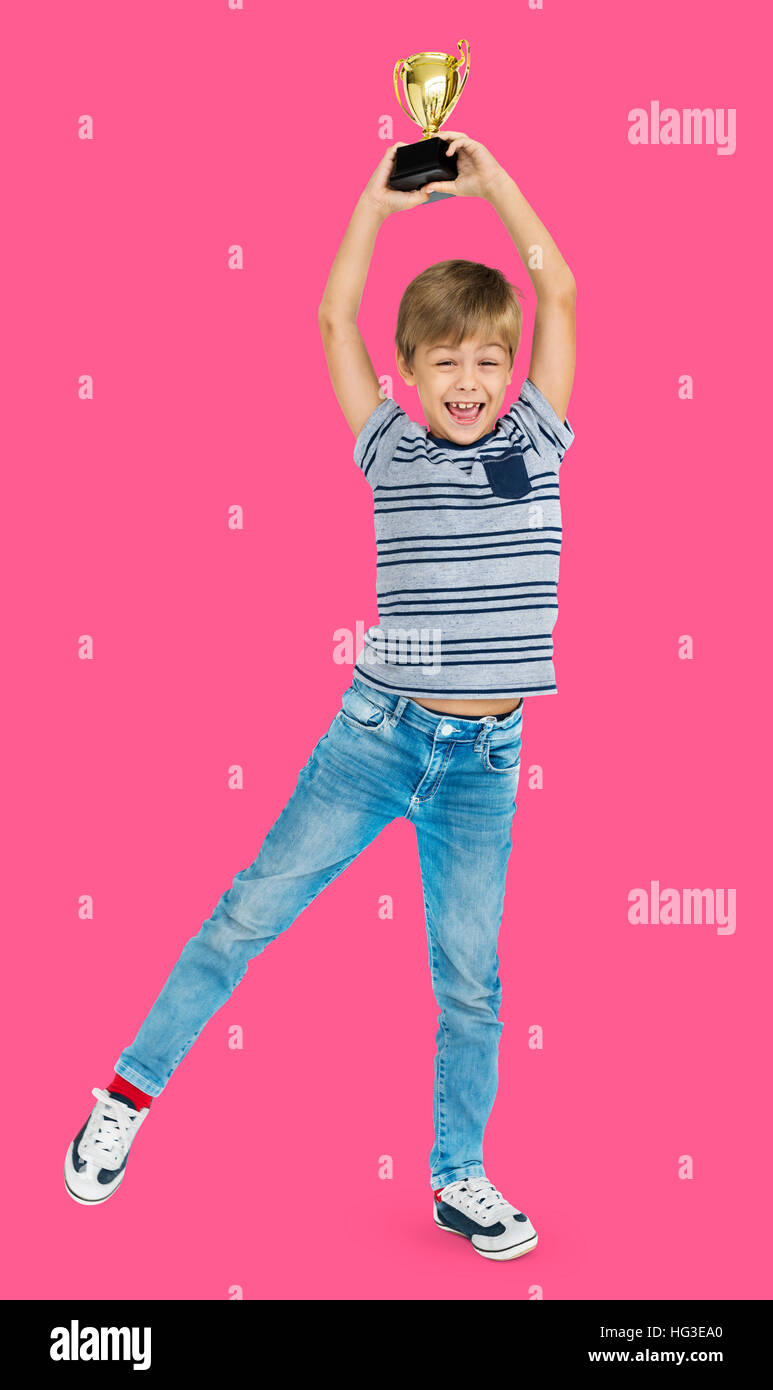Boy Won Award Reward Cup Prize Concept Stock Photo - Alamy