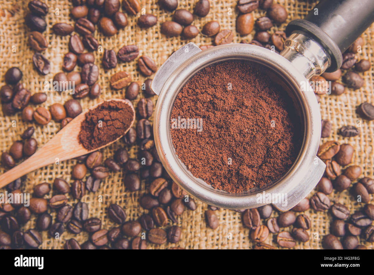Fill coffee powder into port filter with coffee bean background Stock ...