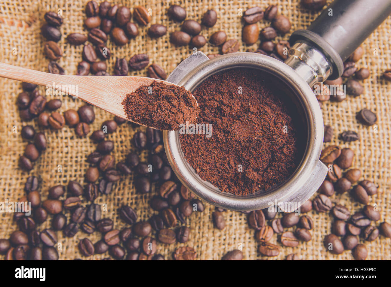Fill coffee powder into port filter with coffee bean background Stock ...