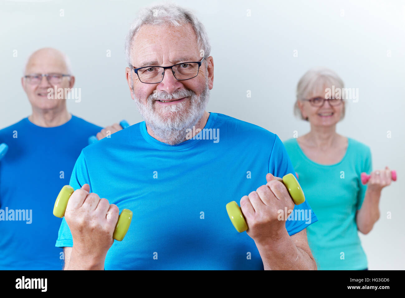 Group Of Seniors In Fitness Class Using Weights Stock Photo - Alamy