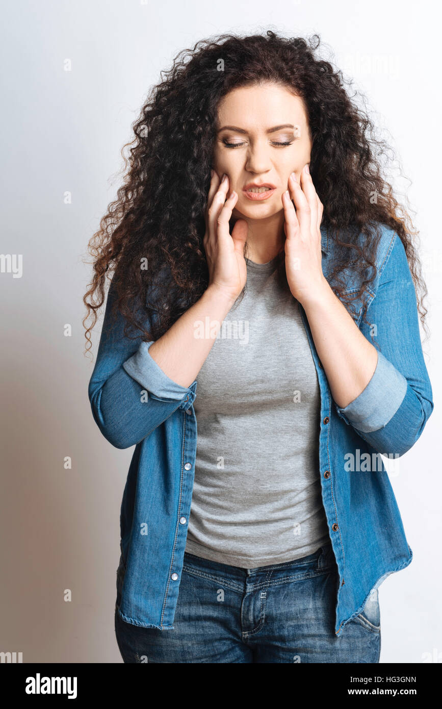 Girl feeling uncertainty in herself Stock Photo - Alamy
