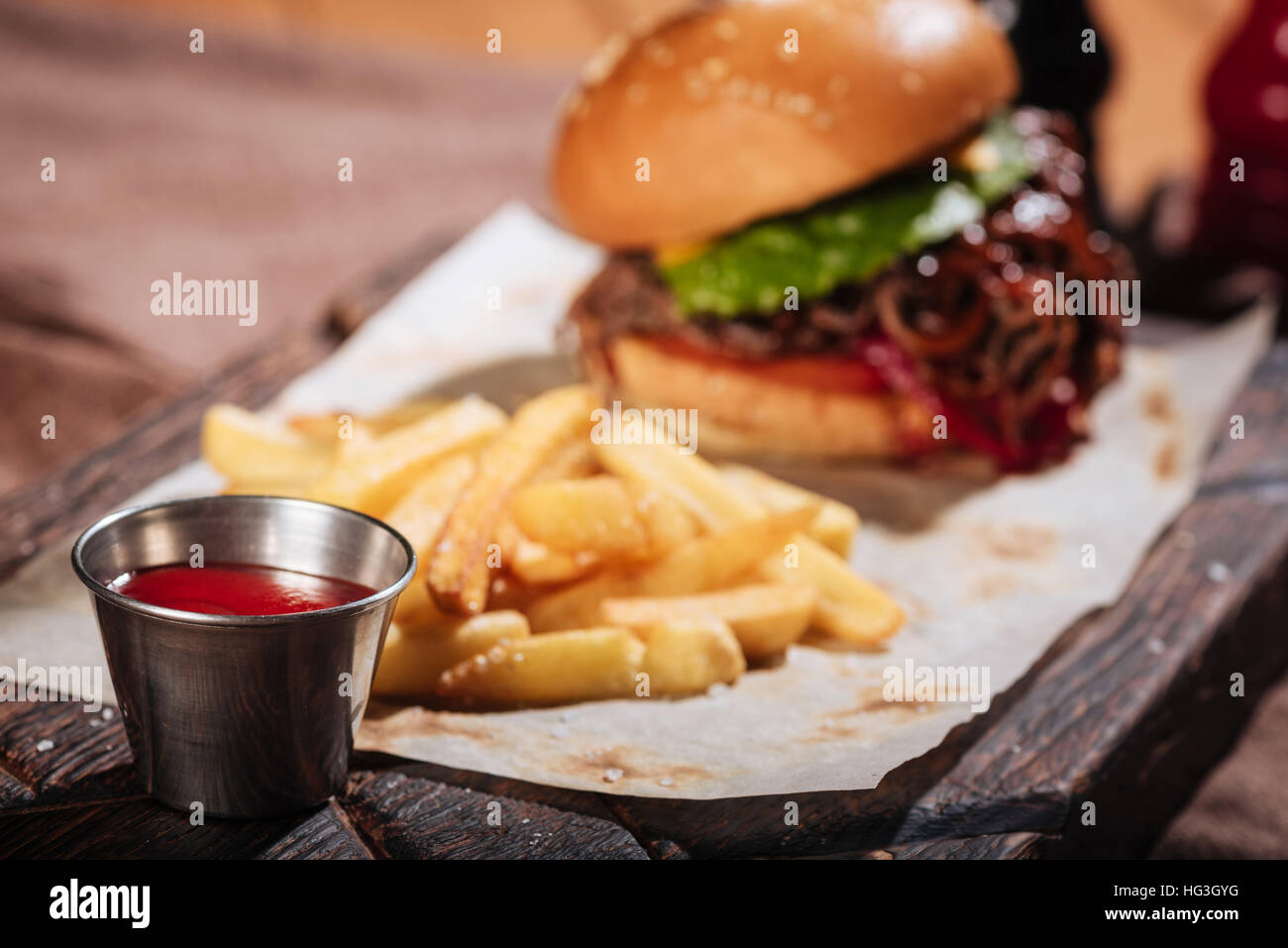 Burger being served hi-res stock photography and images - Alamy