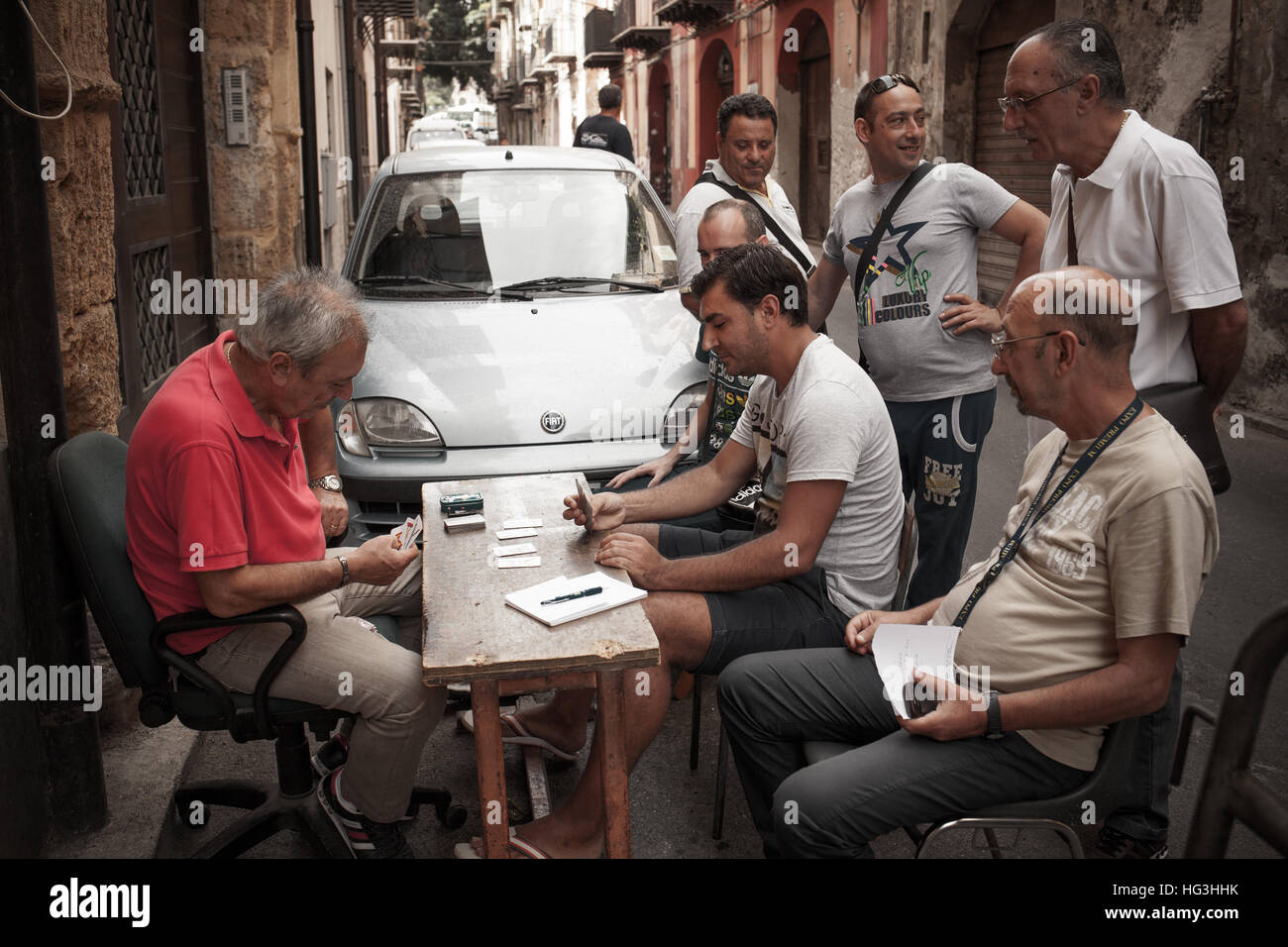 Men playing cards o the street in Palermo, Sicily Stock Photo - Alamy