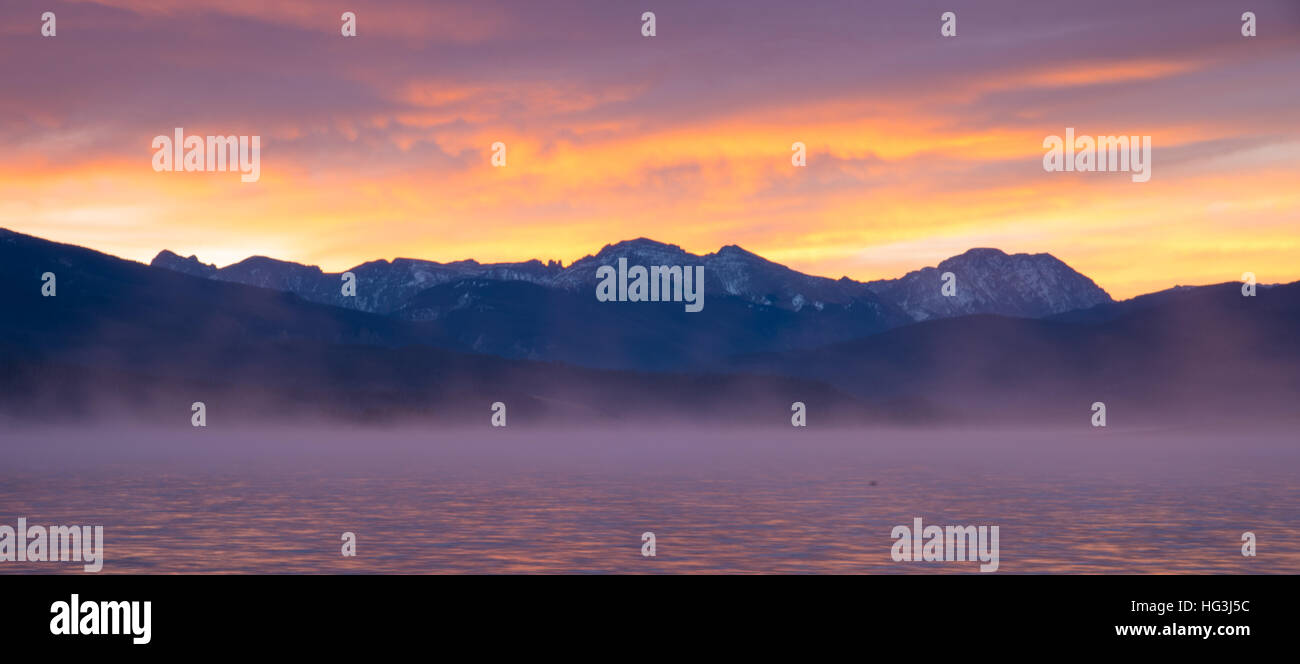 Sun rising behind Shadow Mountain, Colorado with Grand Lake in the ...