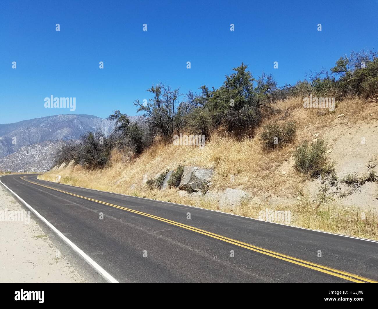 Highway in the desert Stock Photo - Alamy