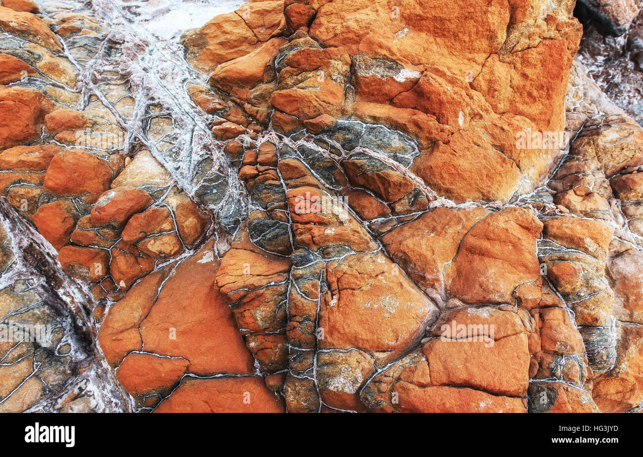 Closeup of a red stone texture background Stock Photo - Alamy