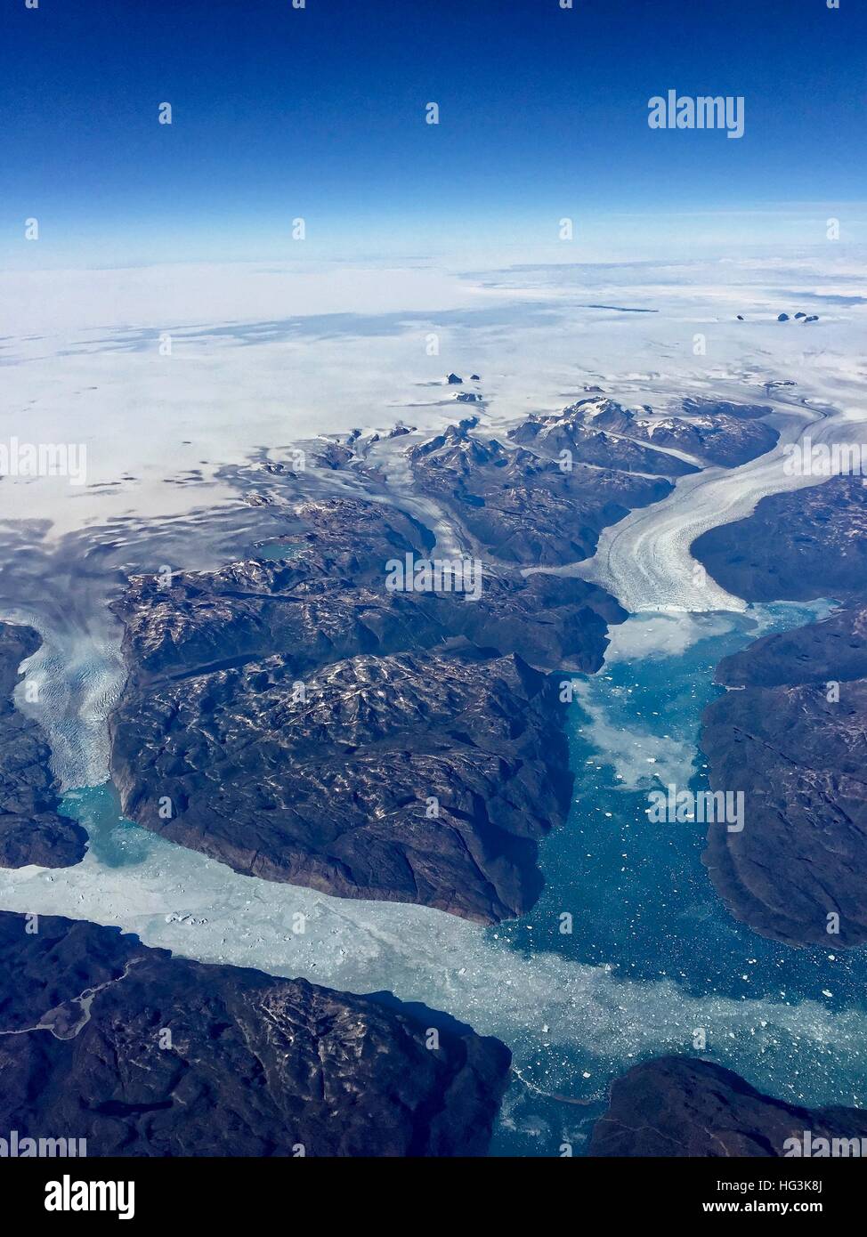 Flying over Greenland Stock Photo - Alamy
