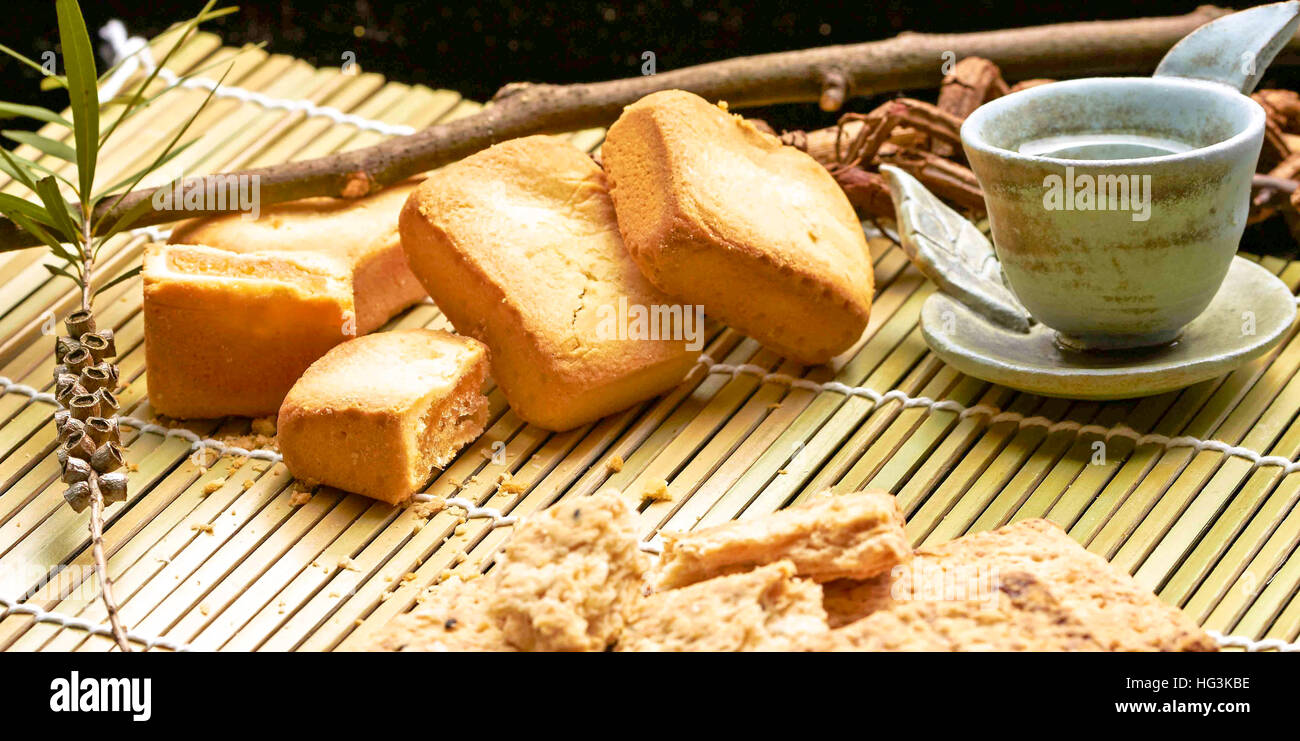Taiwan famous dessert - pineapple cake with tea Stock Photo - Alamy