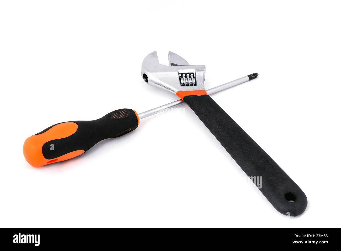screwdriver and adjustable wrench isolated on white background Stock ...