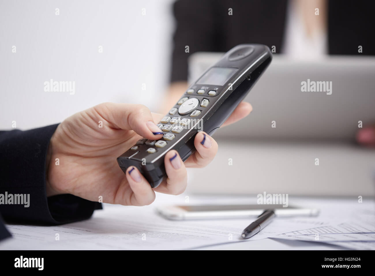 Radio phone in female hands Stock Photo - Alamy