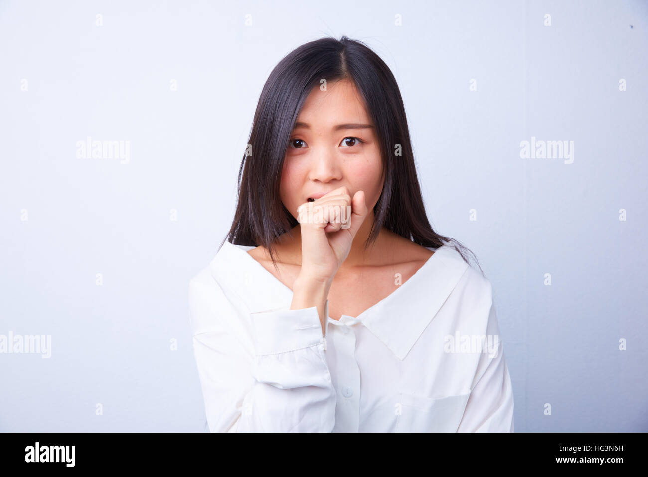 Chinese girl surprised and shocked Stock Photo - Alamy