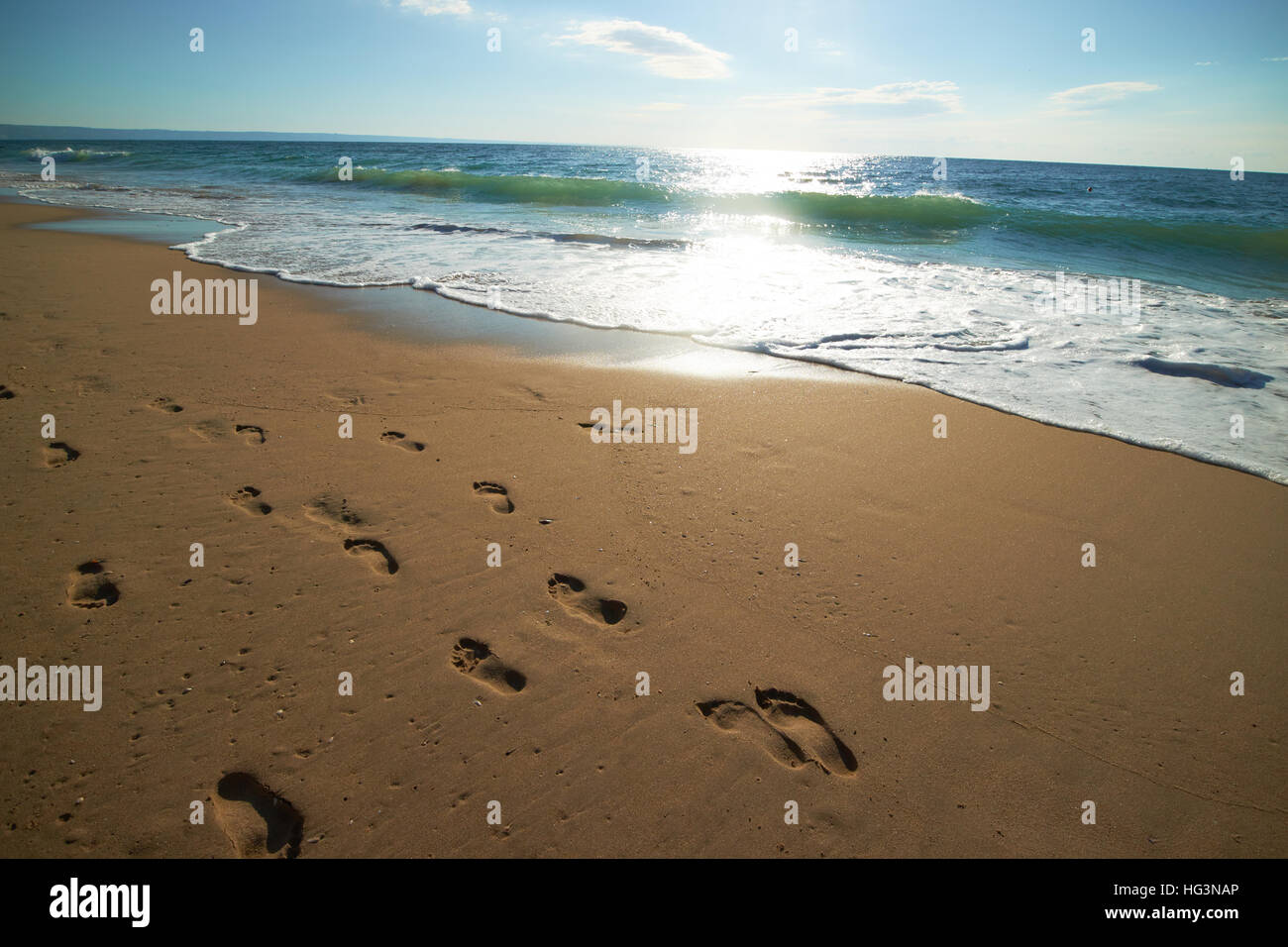 footprints in the sand on the beach Stock Photo - Alamy