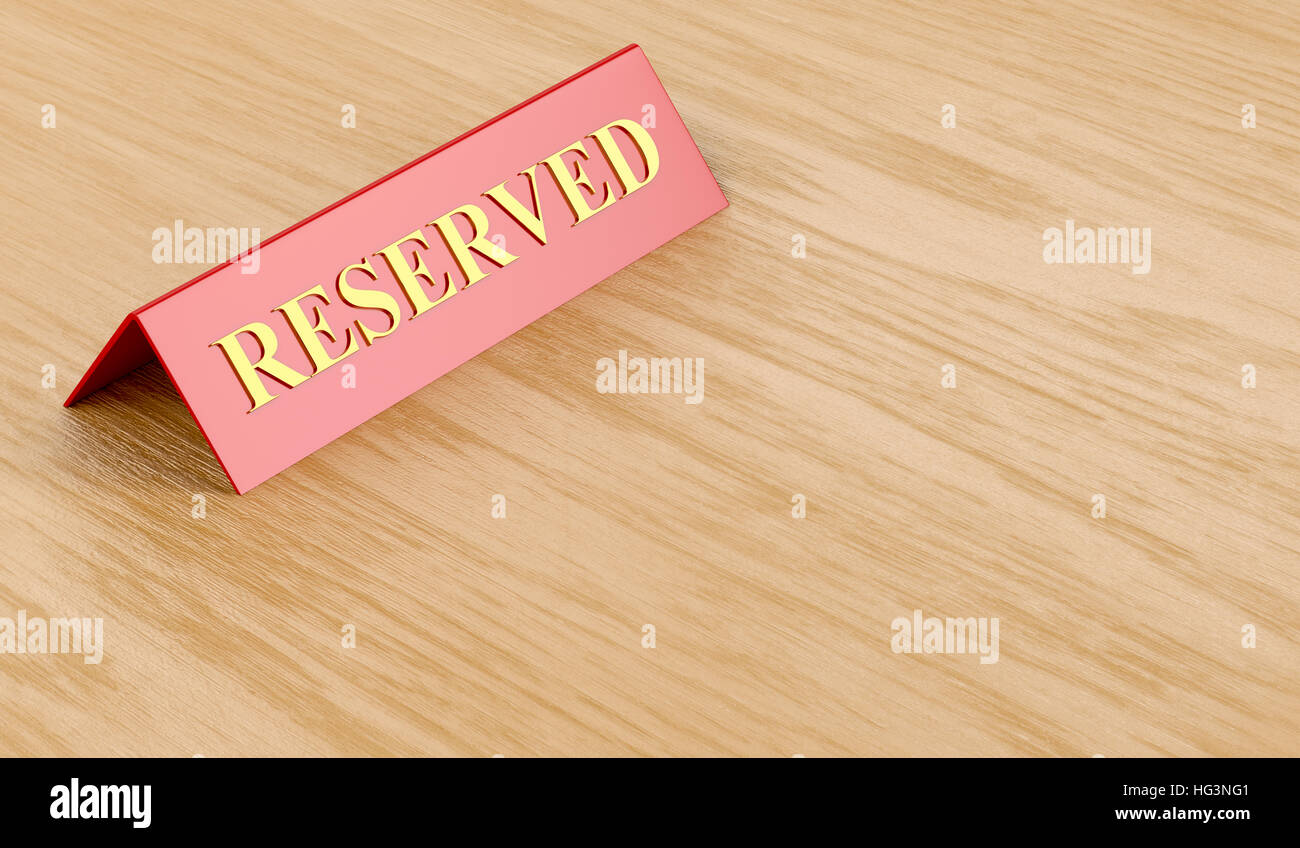 Reserved sign on wooden table Stock Photo - Alamy
