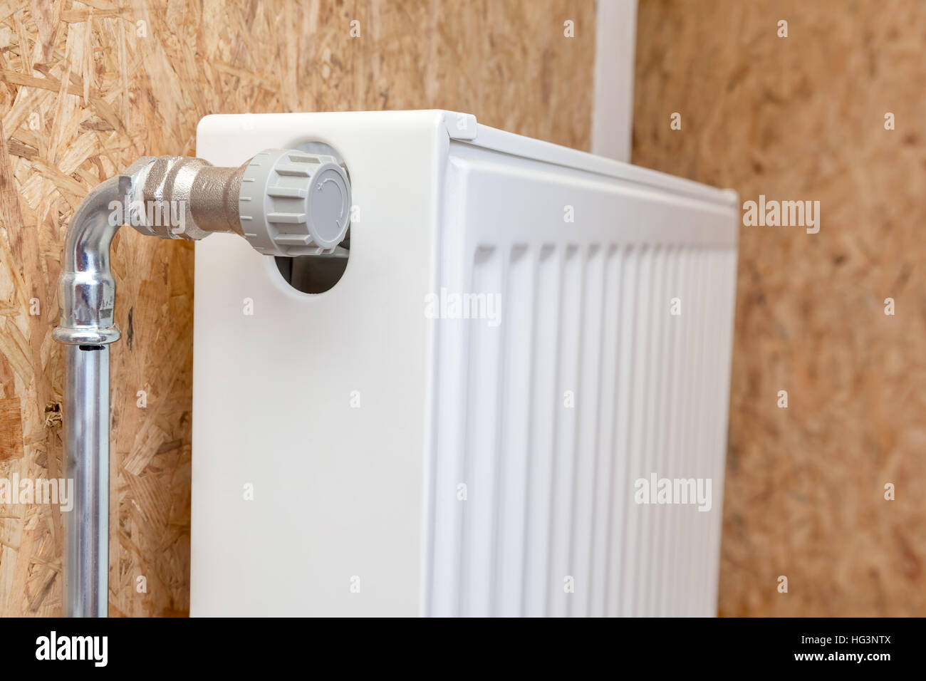 supply to the radiator in the bathroom close up Stock Photo - Alamy