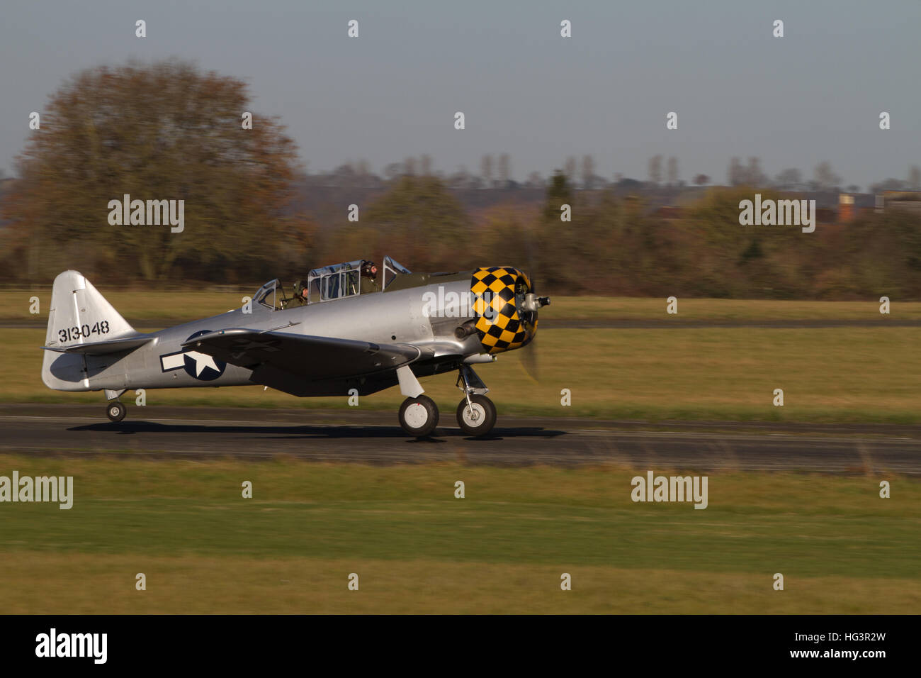 An American ww2 Harvard training aircraft landing at Halfpenny Green ...