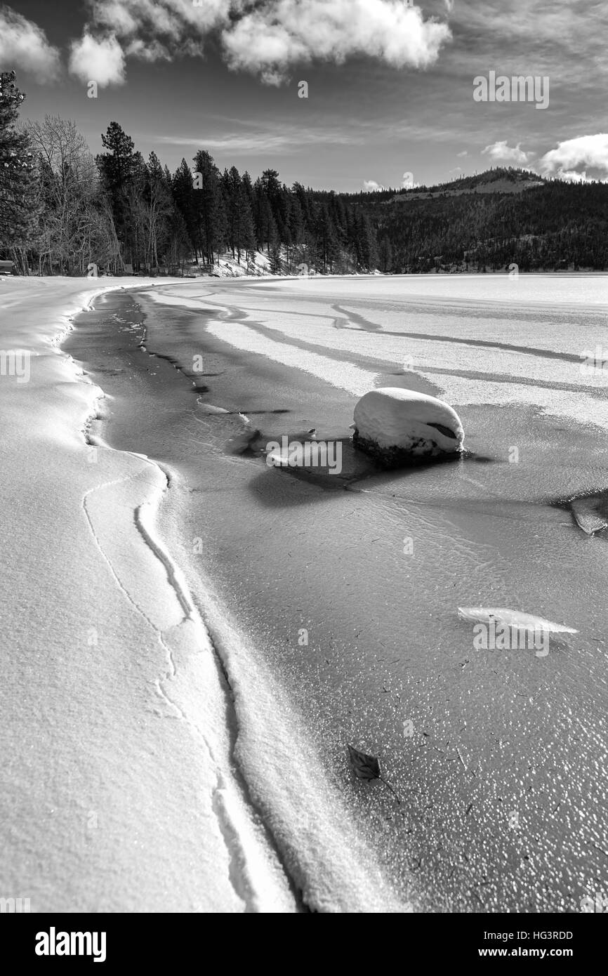 A B&W of frozen Spirit Lake shore line during winter in Spirit Lake ...