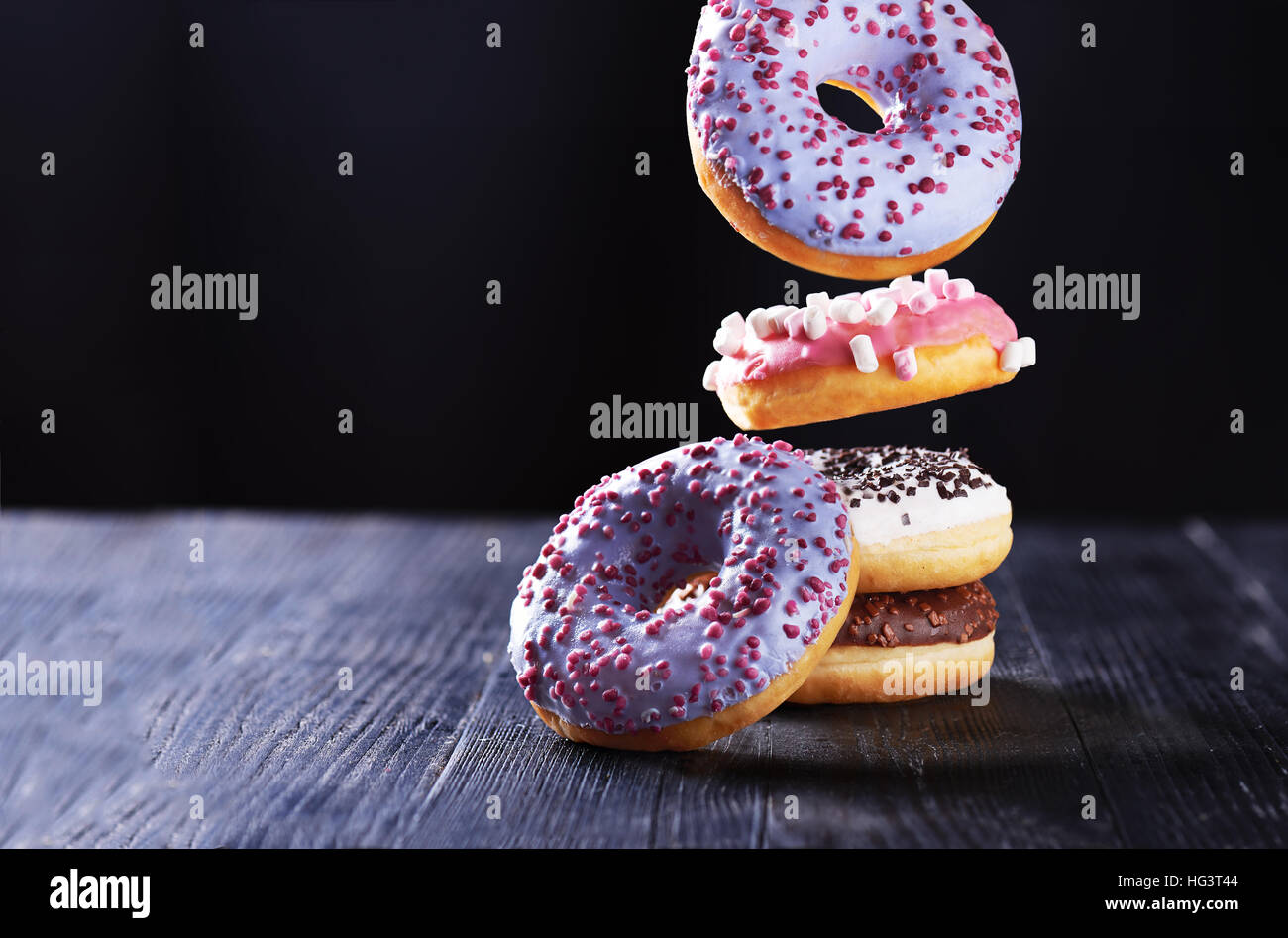 Donut falling hi-res stock photography and images - Alamy