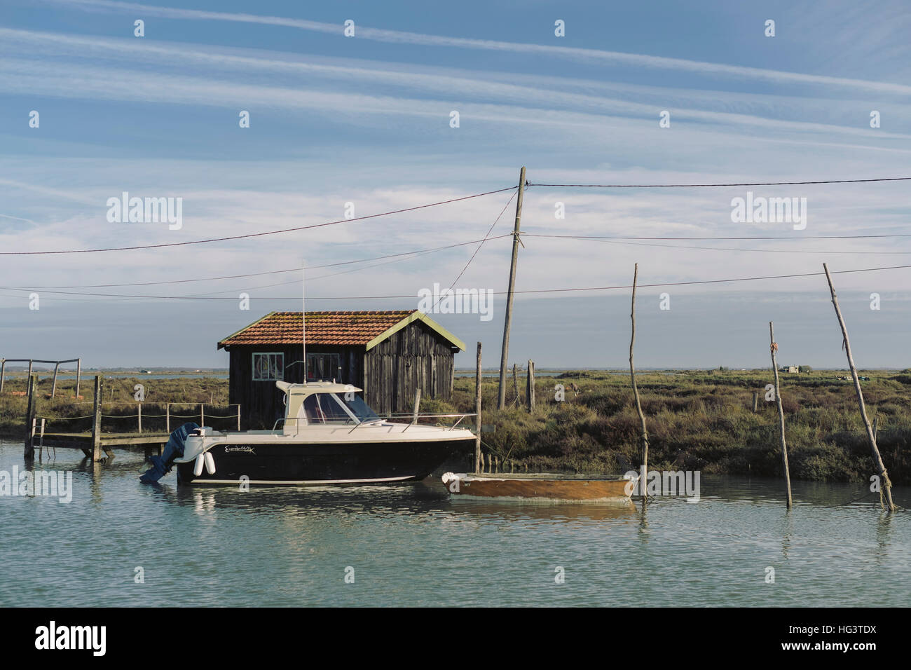 Fisher huts and boats Stock Photo - Alamy