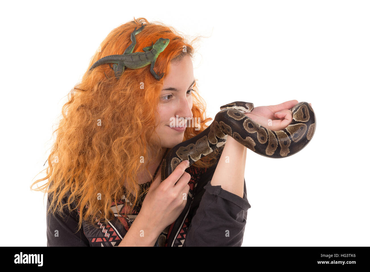 Red hair girl with several pet animals isolated in white Stock Photo ...