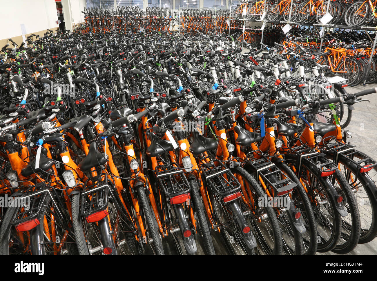 huge warehouse of bicycles for touring on two wheels Stock Photo - Alamy