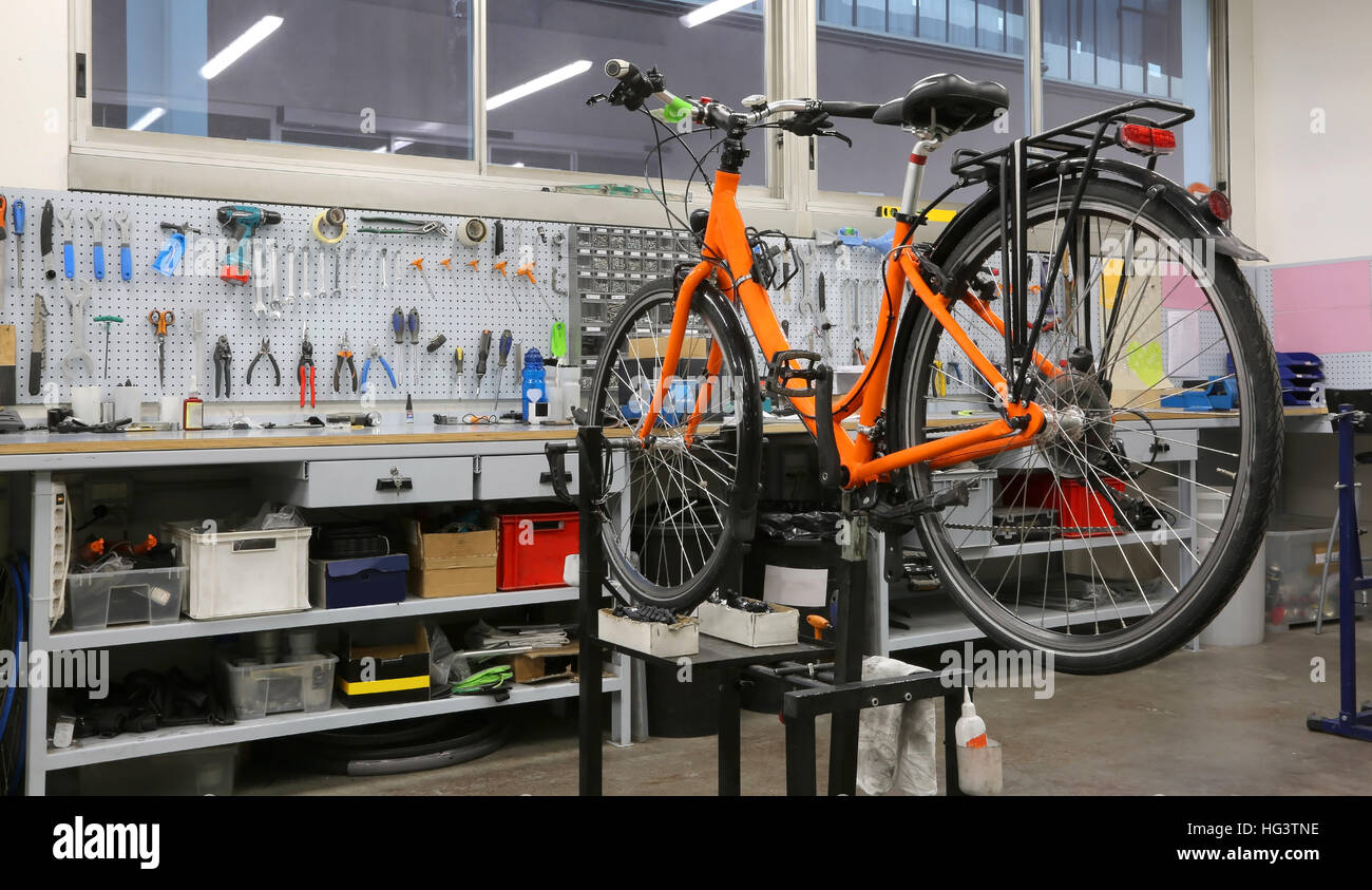 wide and well-equipped workshop for repairing bicycles Stock Photo - Alamy