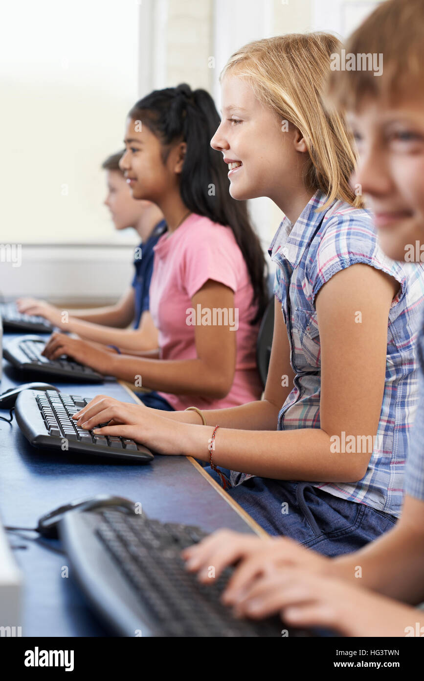 Female Elementary Pupil In Computer Class Stock Photo - Alamy