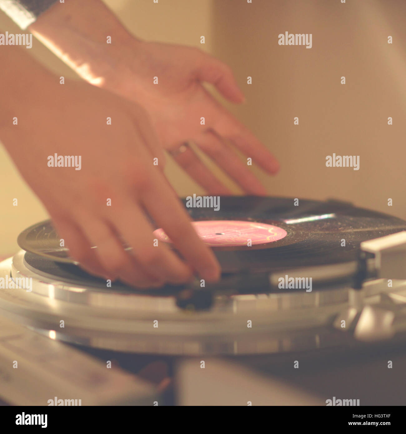 Hands putting vinly on turntable - Hi fidelity soudn concept Stock ...
