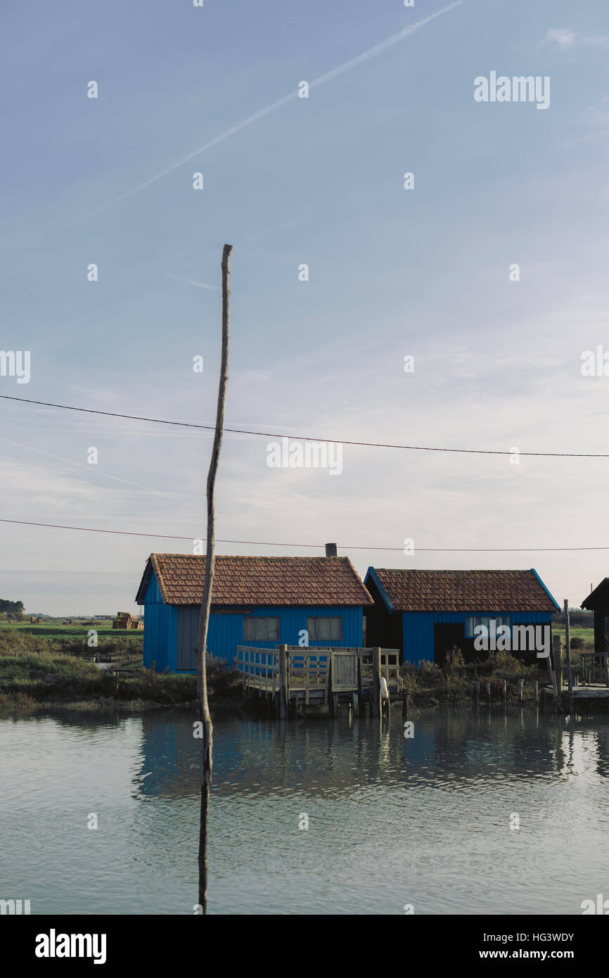 Blue fisher huts Stock Photo - Alamy