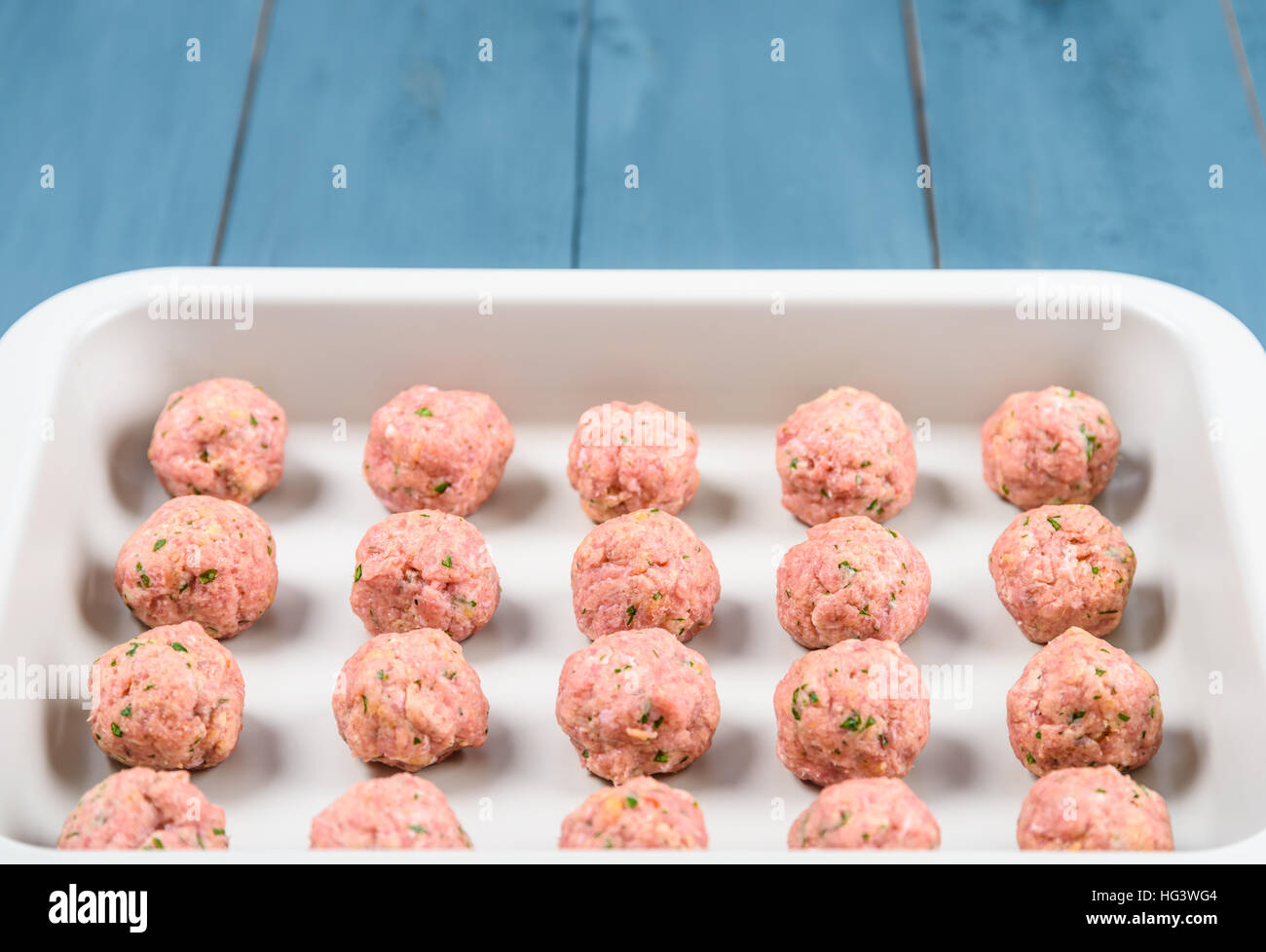 Preparing Raw Meatballs In Pan Stock Photo - Alamy