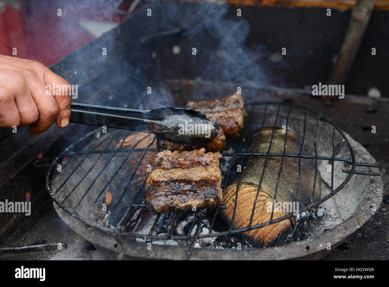 Grilling traditional Romanian Mititei ( minced kebab Stock Photo - Alamy