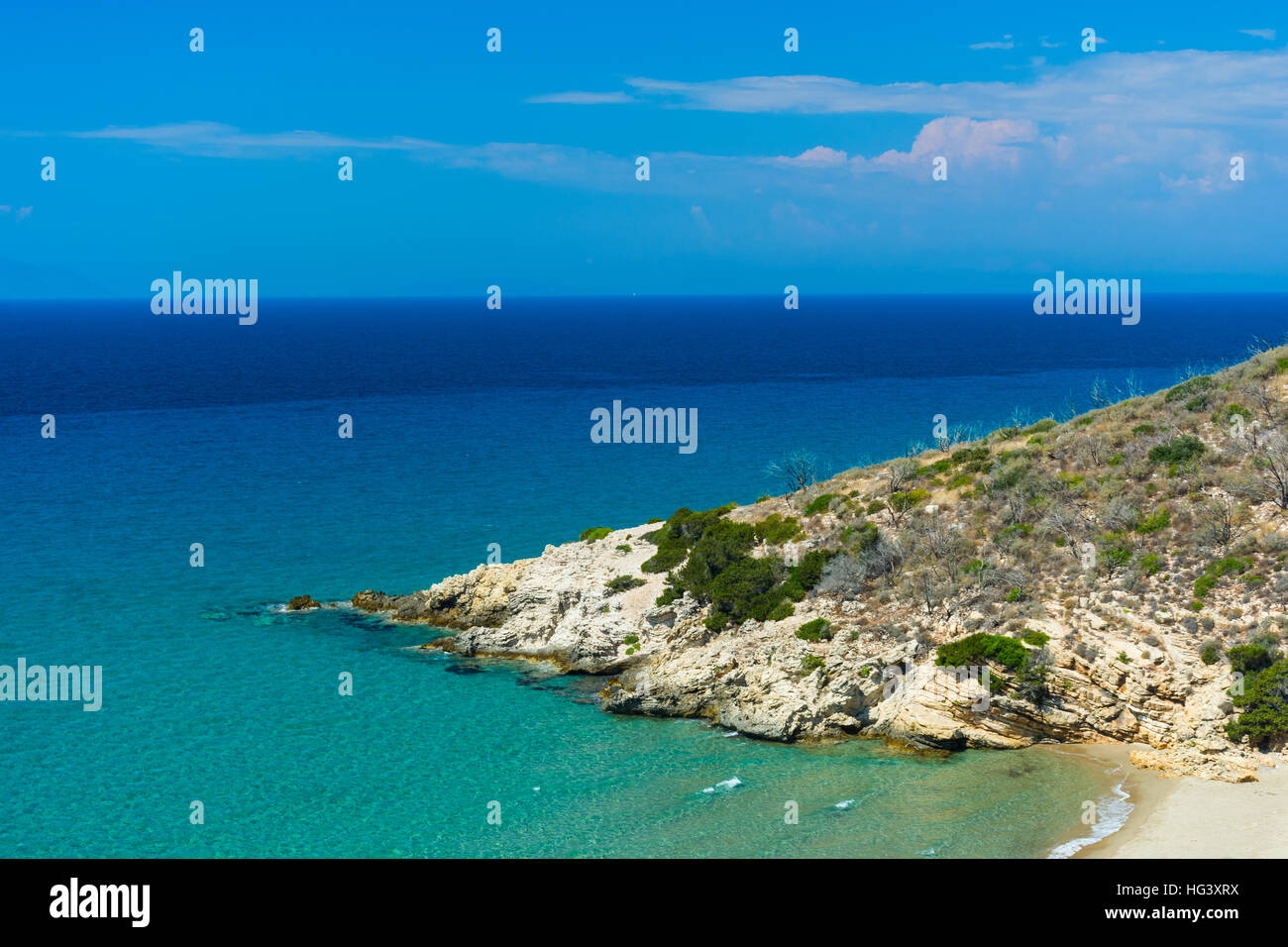 Isolated rock in the sea, on the beaches of Greece and Sicily Stock ...