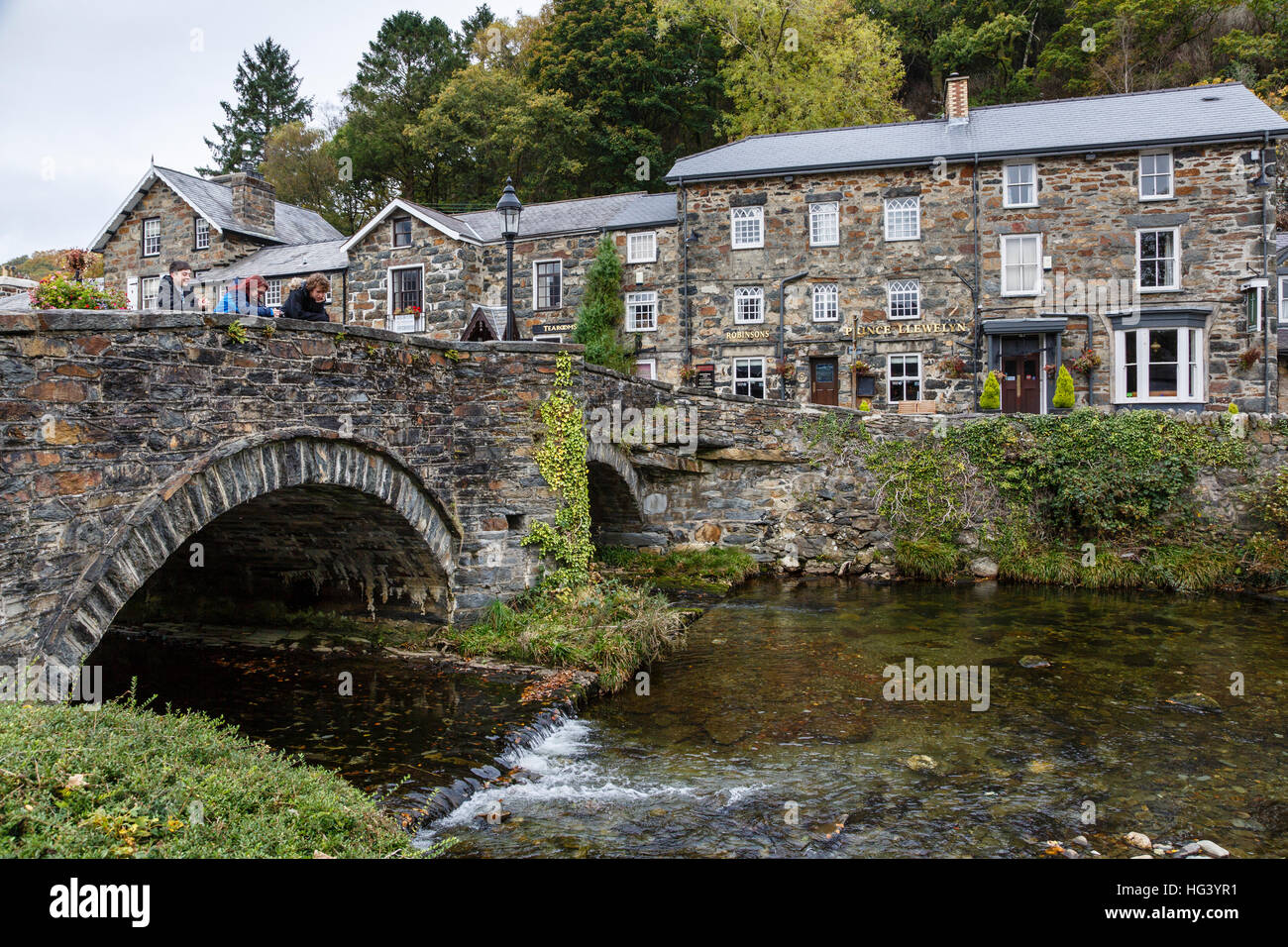 Bridge over the River Colwyn and the Prince Llewelyn Hotel at ...