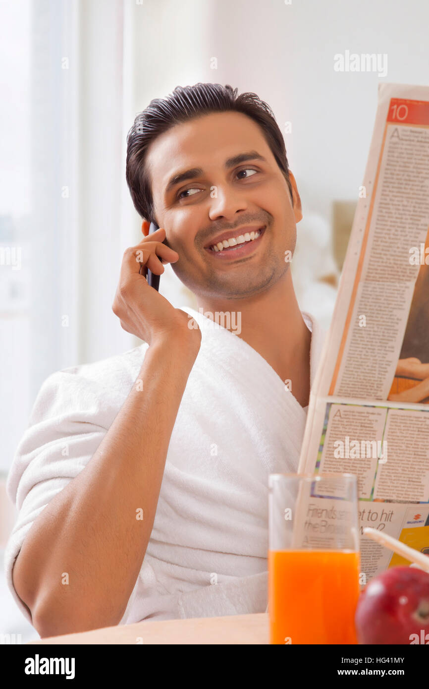Man talking on phone Stock Photo - Alamy