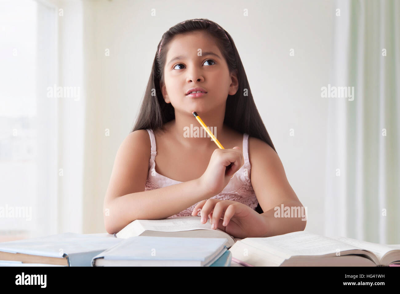 Girl thinking hi-res stock photography and images - Alamy