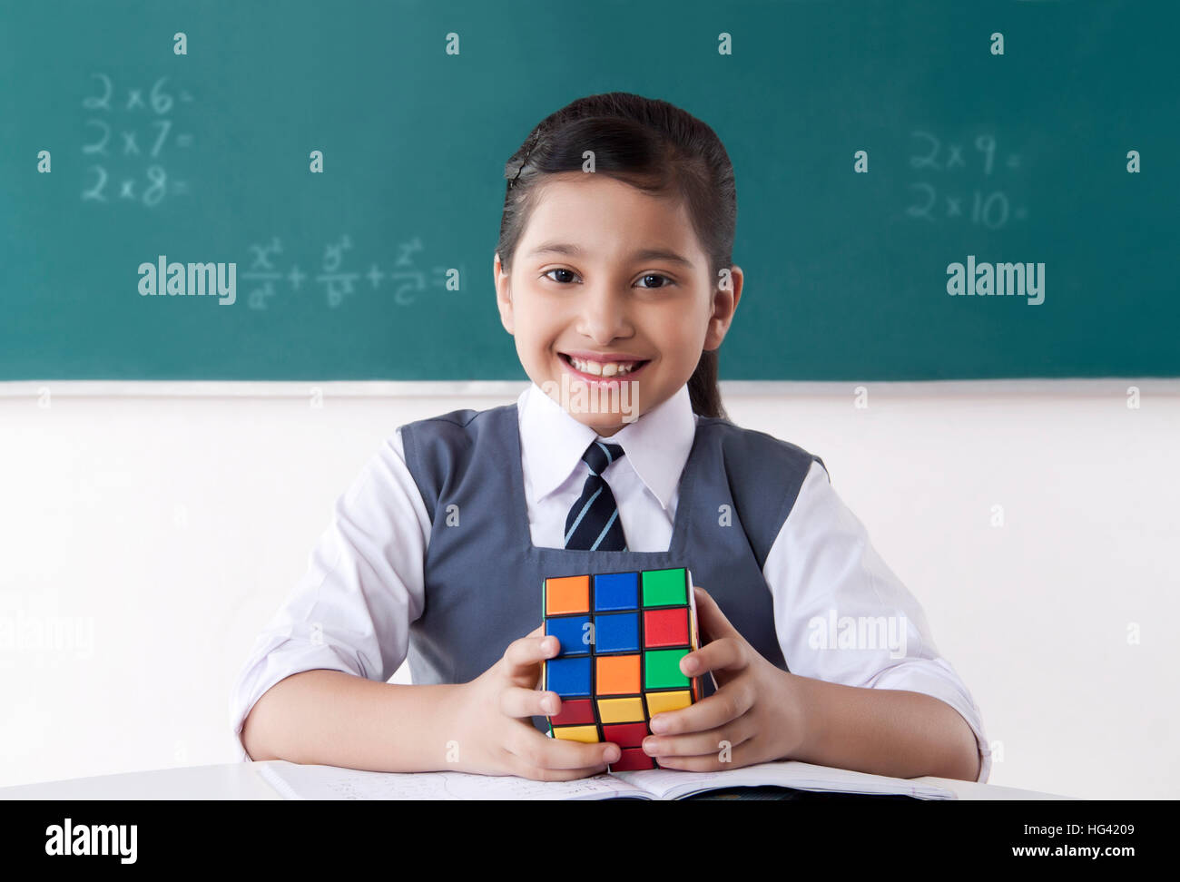 Girl rubik cube in hi-res stock photography and images - Alamy
