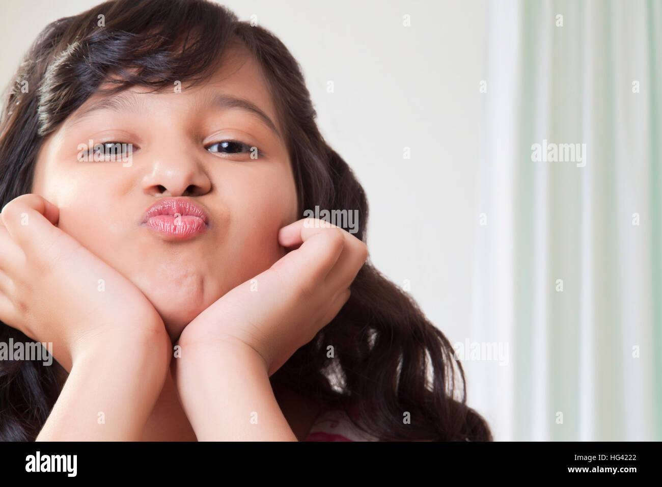 Indian girl head in hands High Resolution Stock Photography and Images ...