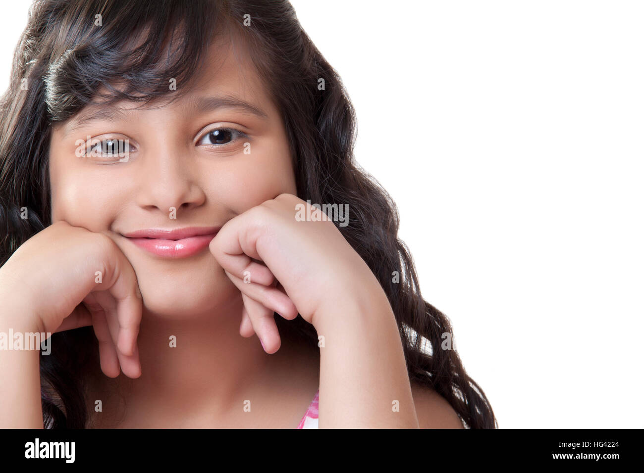 Portrait of a girl with her hand on her cheek Stock Photo - Alamy