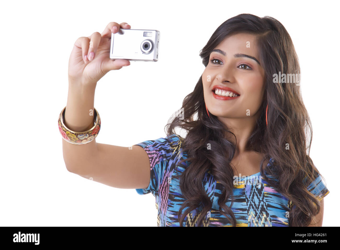 Young woman taking self photo with camera Stock Photo - Alamy