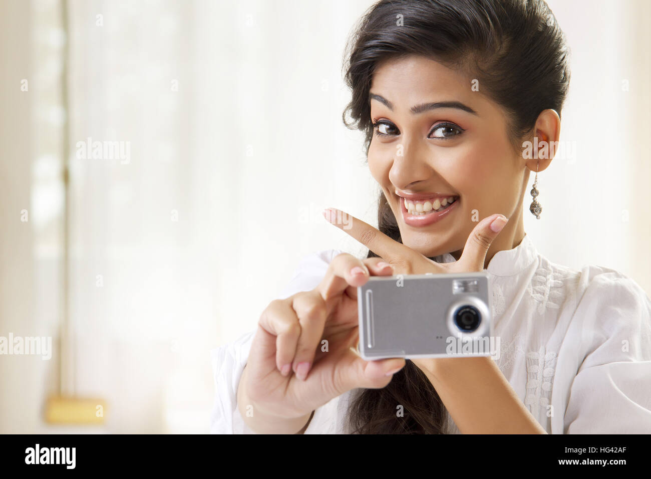 Shot young woman home showing hi-res stock photography and images - Alamy
