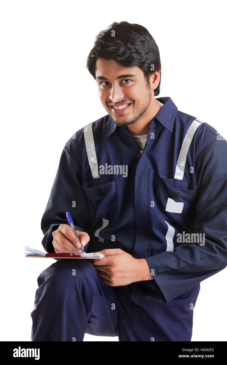 Mechanic Holding Clipboard Stock Photo - Alamy
