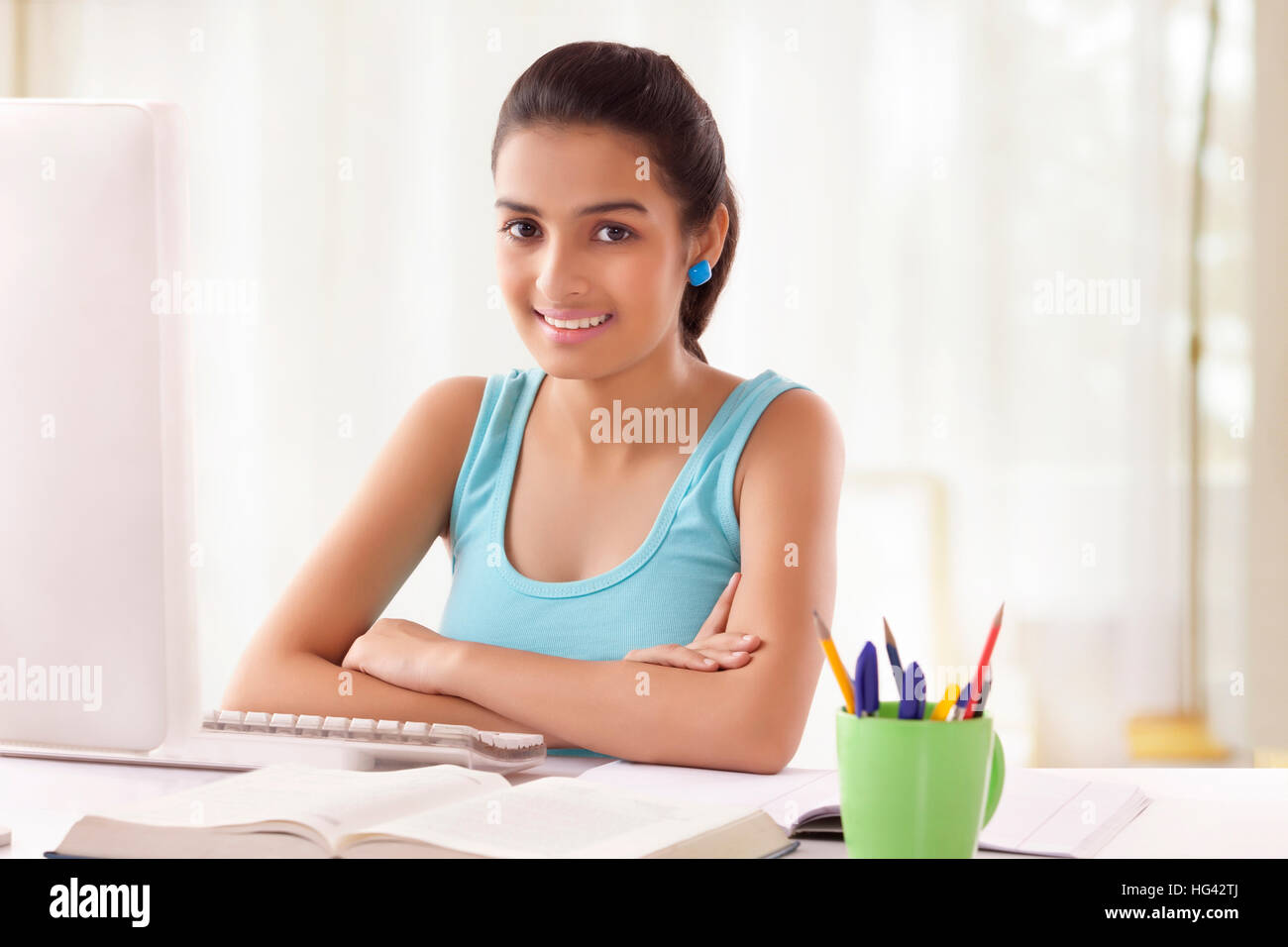 Teenage Girls using computer at home Stock Photo - Alamy