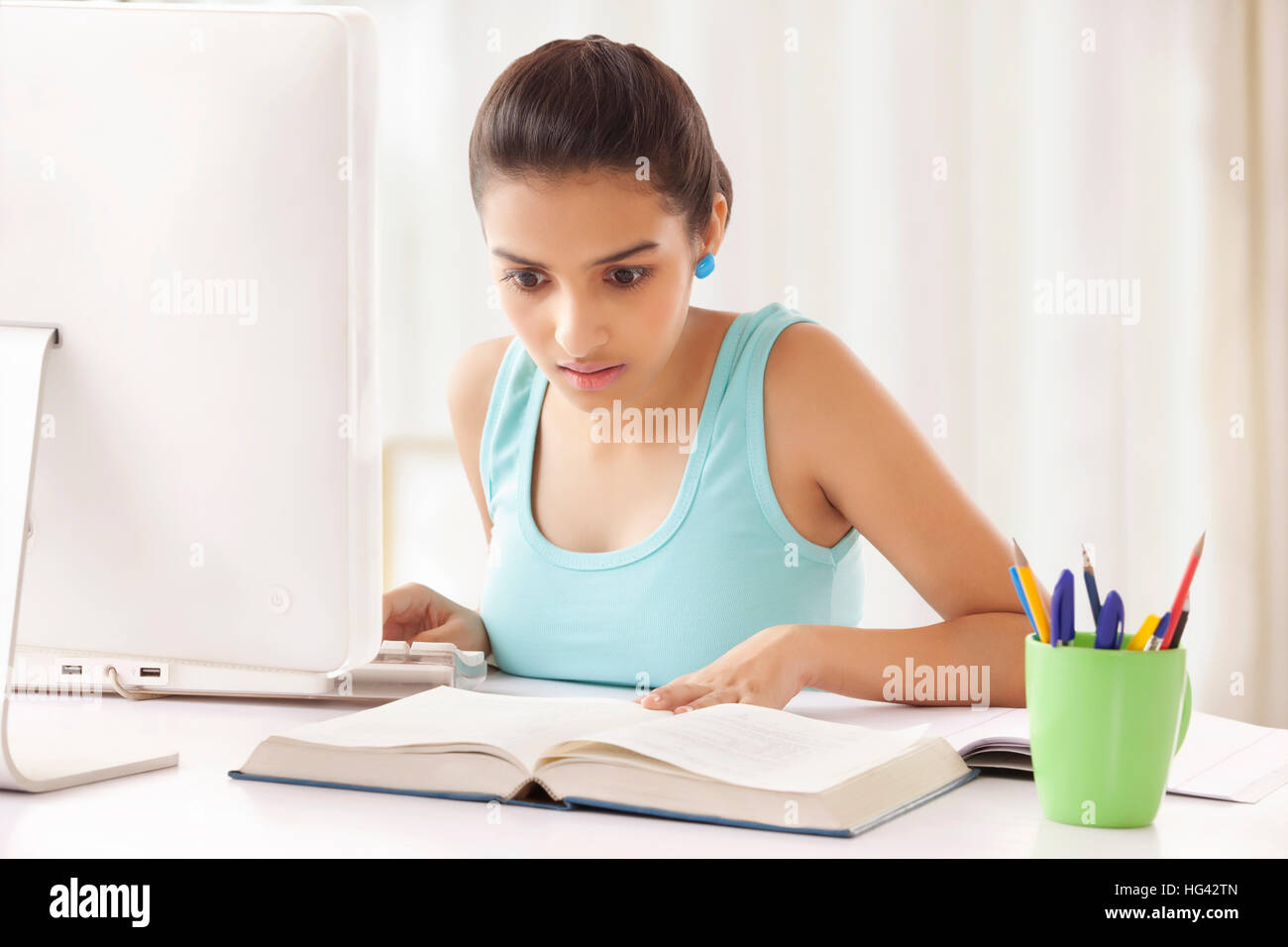 Portrait of Teenage Girls student studying front of computer Stock ...