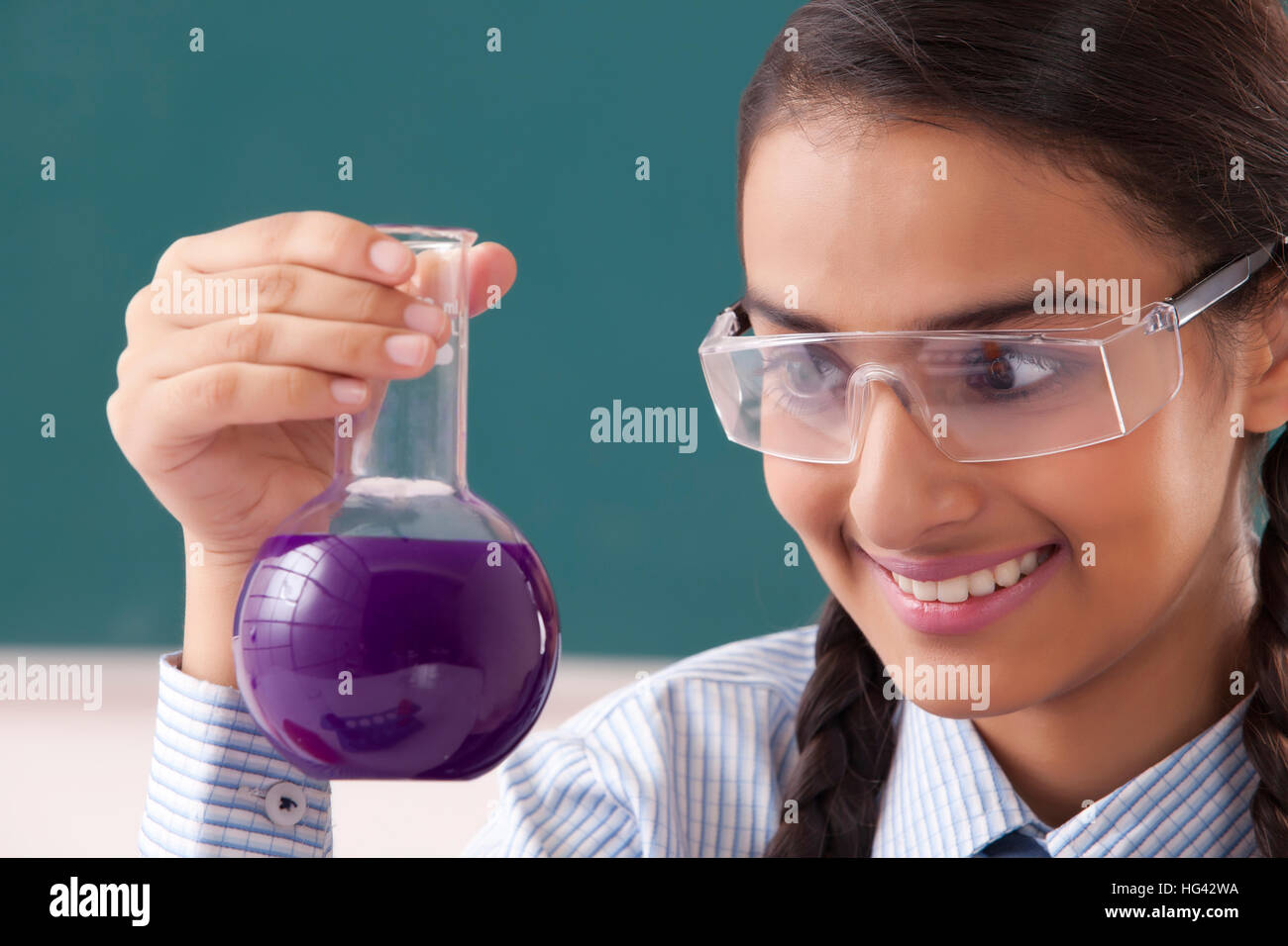 Teenage Girls doing experiment in laboratory Stock Photo - Alamy