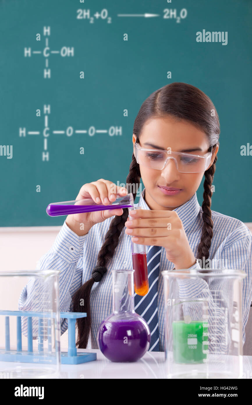 Teenage Girls doing experiment in laboratory Stock Photo - Alamy