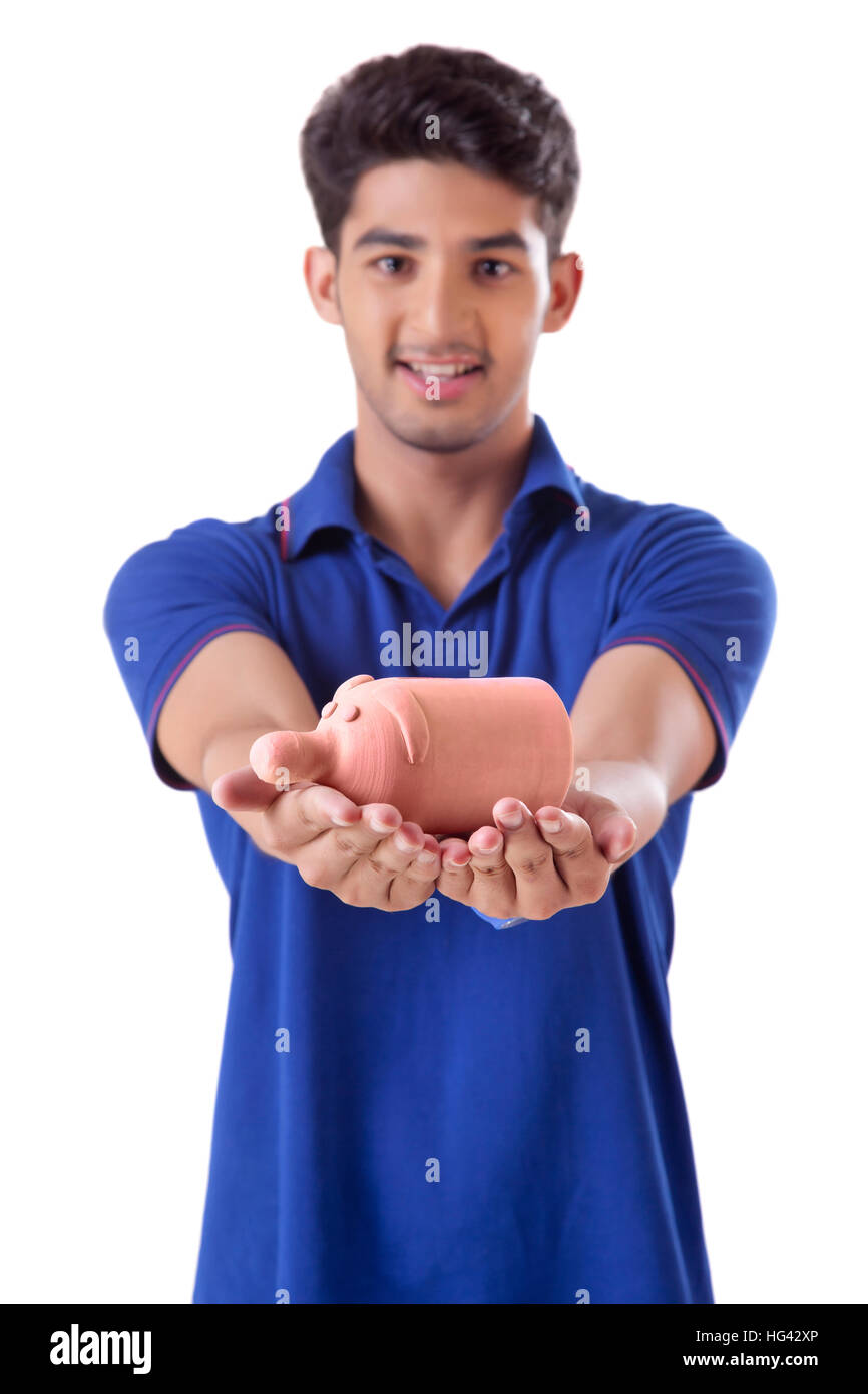 young college student holding a small piggy bank Stock Photo - Alamy